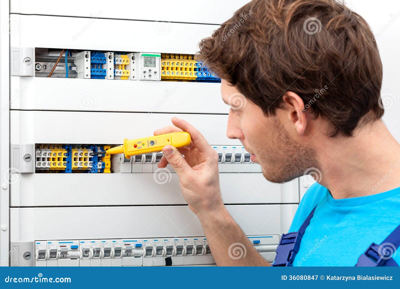 Repairman Fixing a Switchboard Stock Image - Image of electrical ...