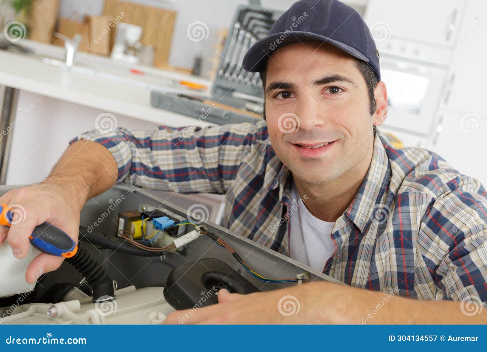 Repairman Fixing Washing Machine Stock Image - Image of happy, like ...