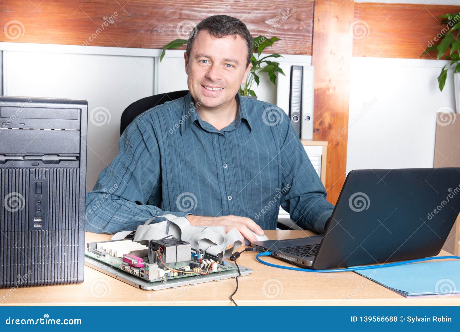 Repairman Professional Repair Computer with Laptop Stock Photo - Image ...