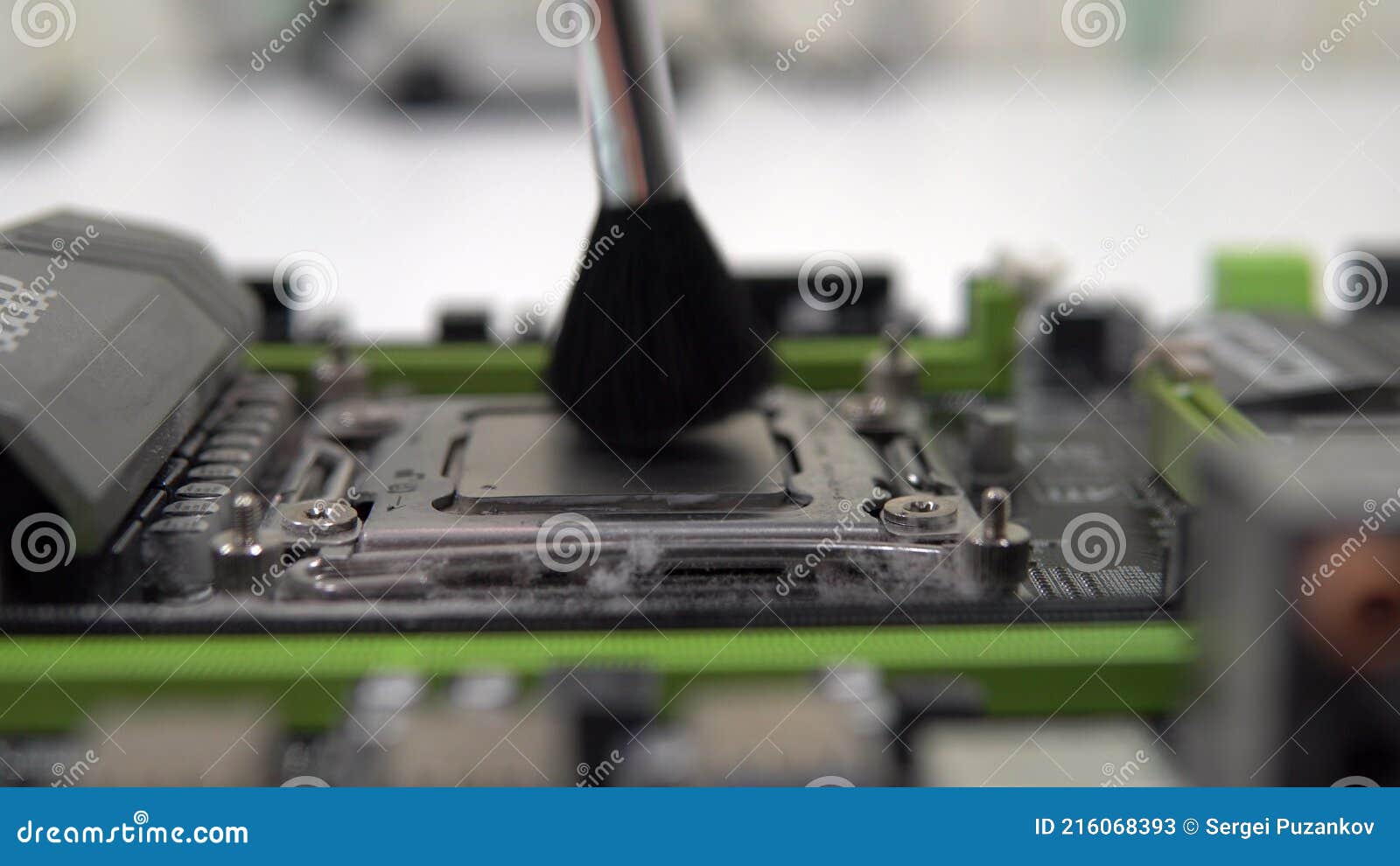 The Repairman Removes the Brush Dust from the Main Processor Installed ...