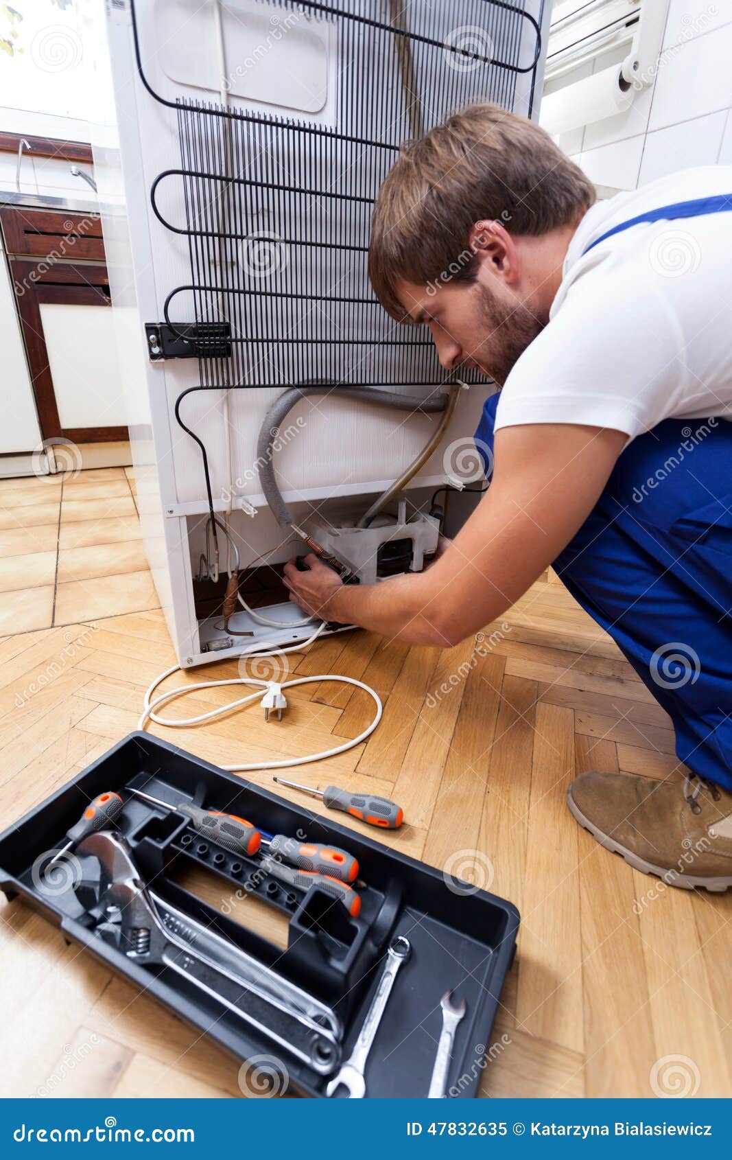 Repairman with Tools in the Kitchen Stock Image - Image of tools ...