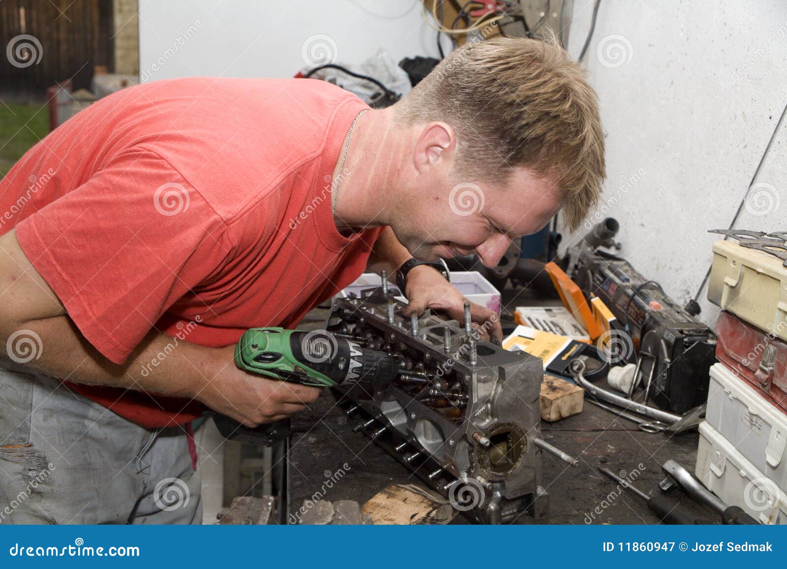 Repairman by the work stock image. Image of auto, garage - 11860947