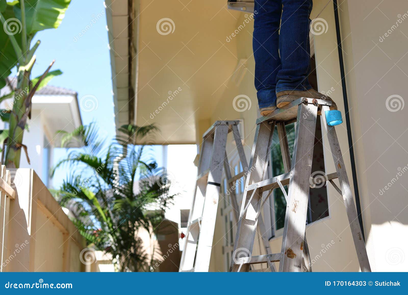 Repairman Worker Standing on Ladder Stock Image - Image of handyman, home: 170164303