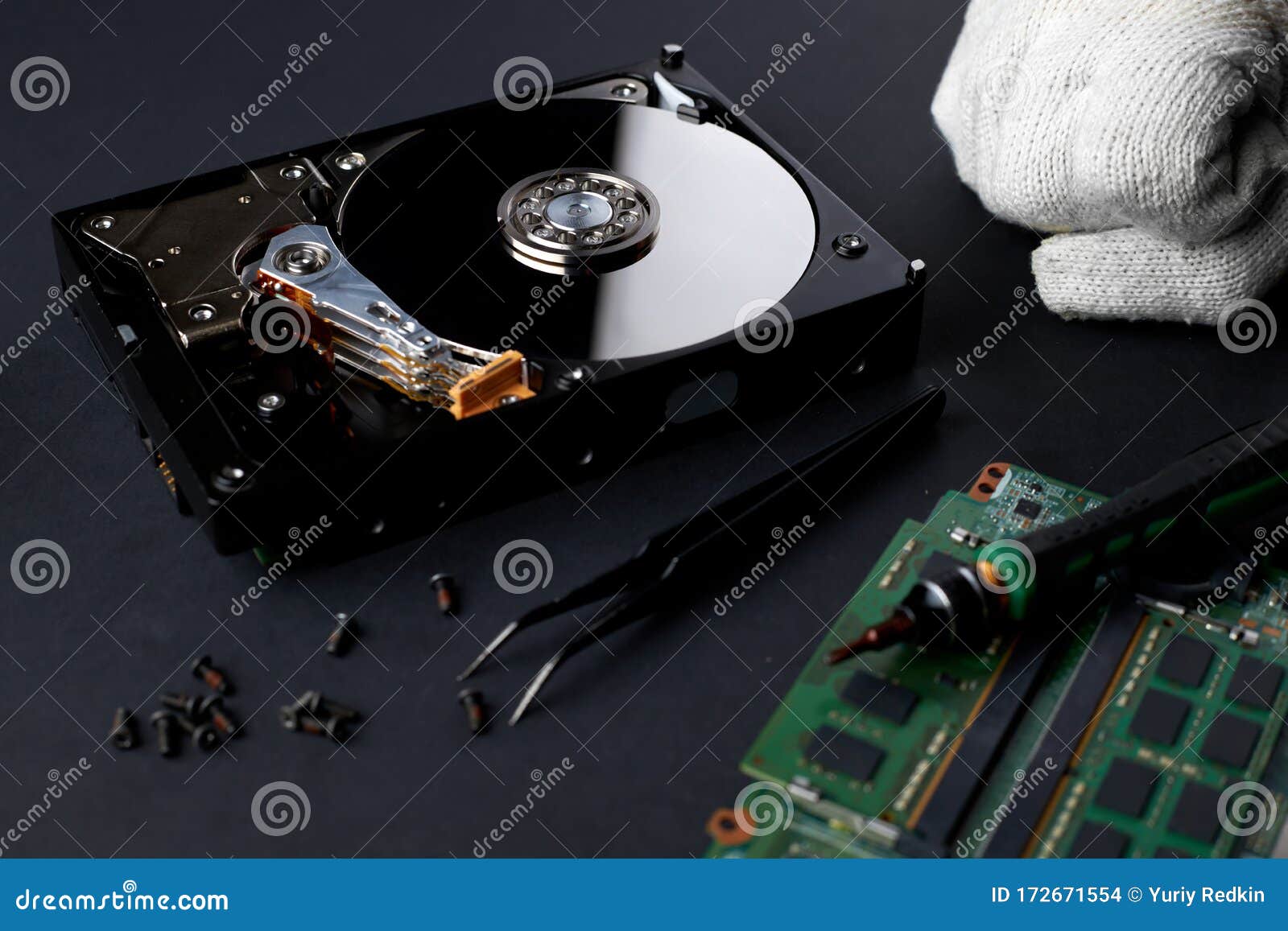 Repairs Broken Computer Hard Disk Drive by Engineer. Stock Photo ...