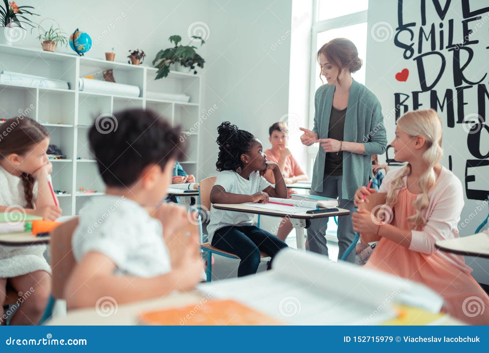Teacher Slowly Explaining Meaning of the Exercise. Stock Image - Image ...