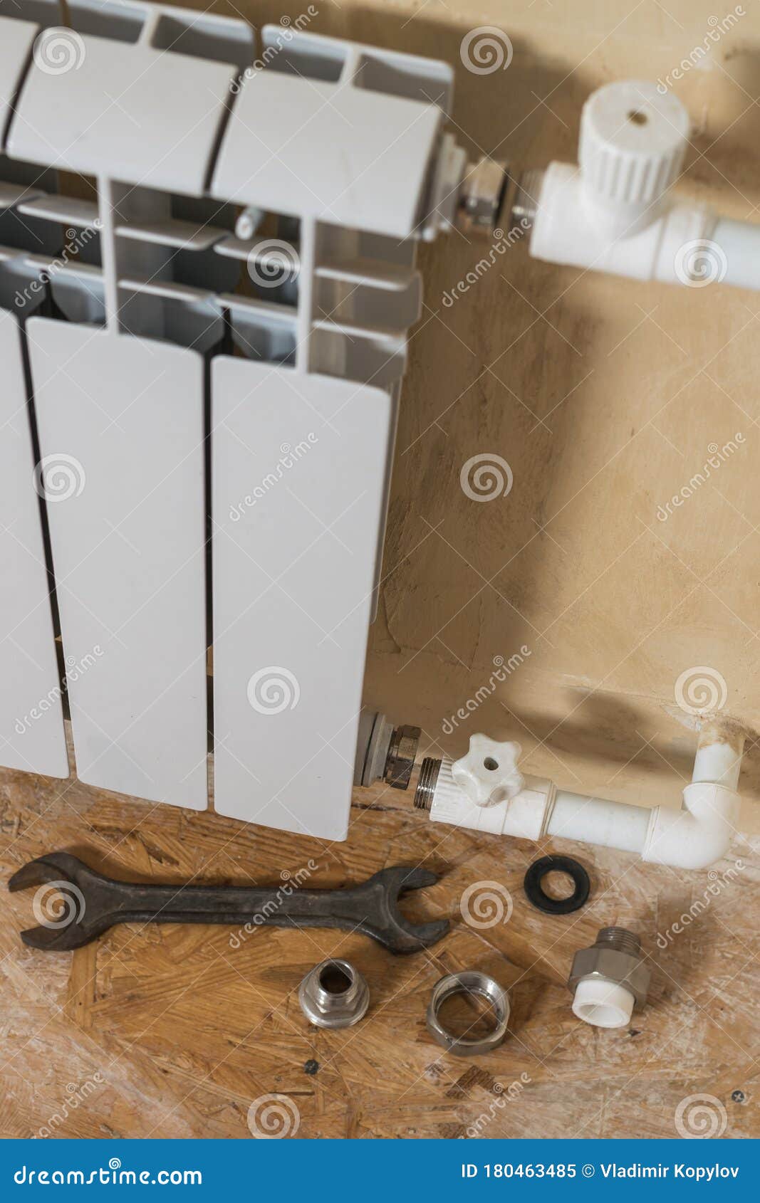 Replacement of a Broken Leaking Radiator in a Private Home. Stock Image ...