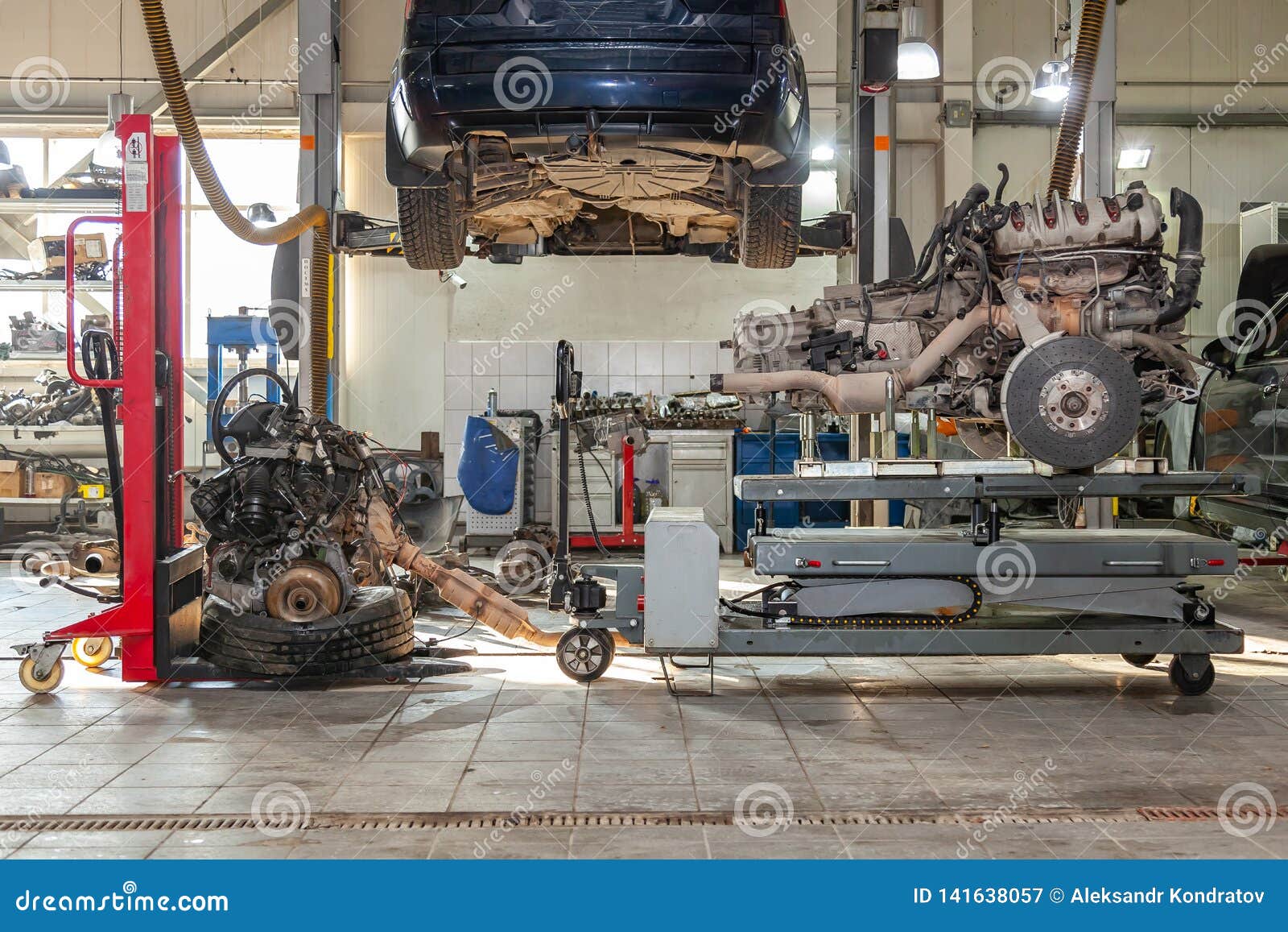 Replacement Engine Used on a Table Mounted for Installation on a Car ...