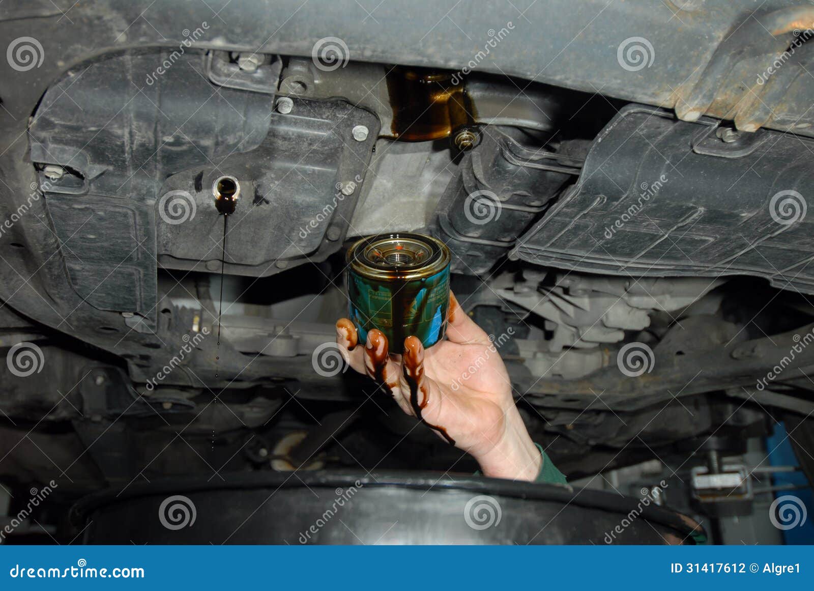 Replacement of oil filter stock photo. Image of detail - 31417612