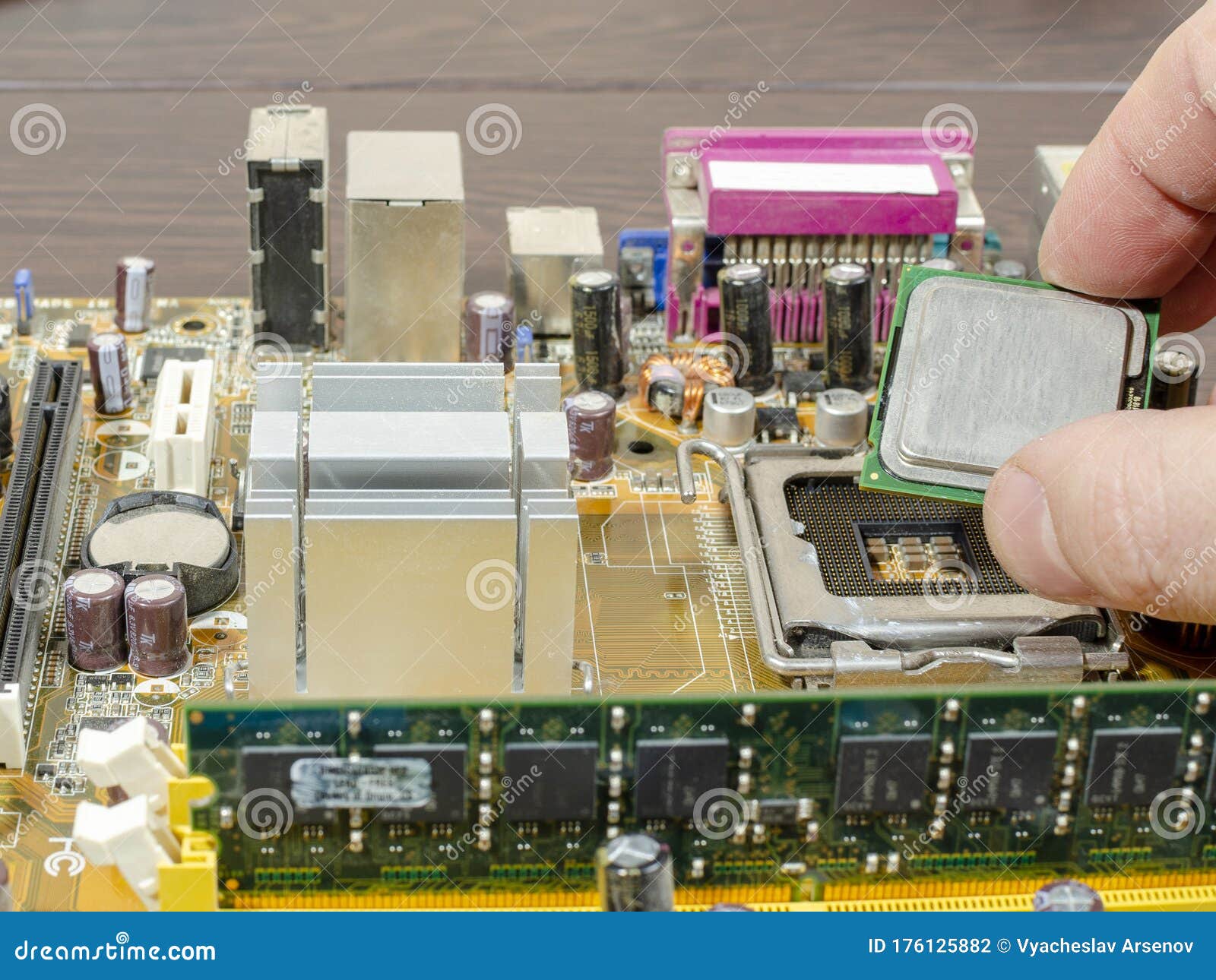 Replacement of the Processor on the Motherboard Close-up Stock Photo ...