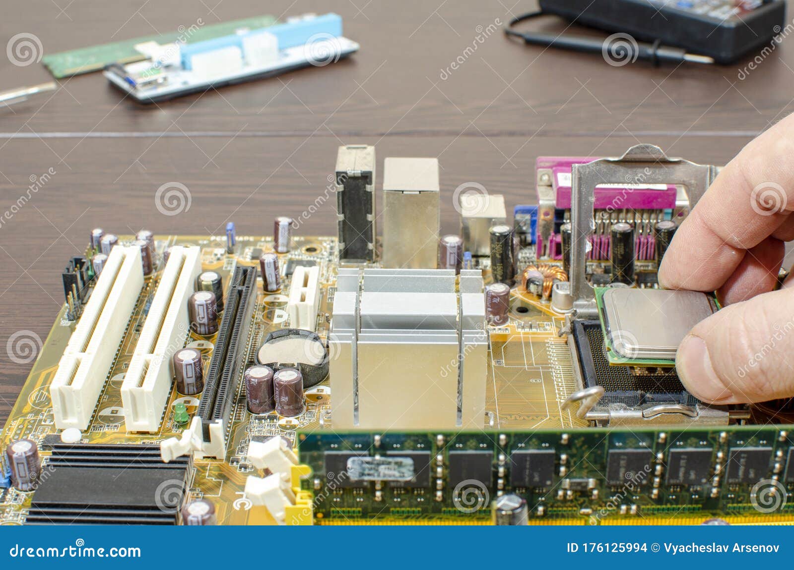 Replacement of the Processor on the Motherboard Close-up Stock Photo ...