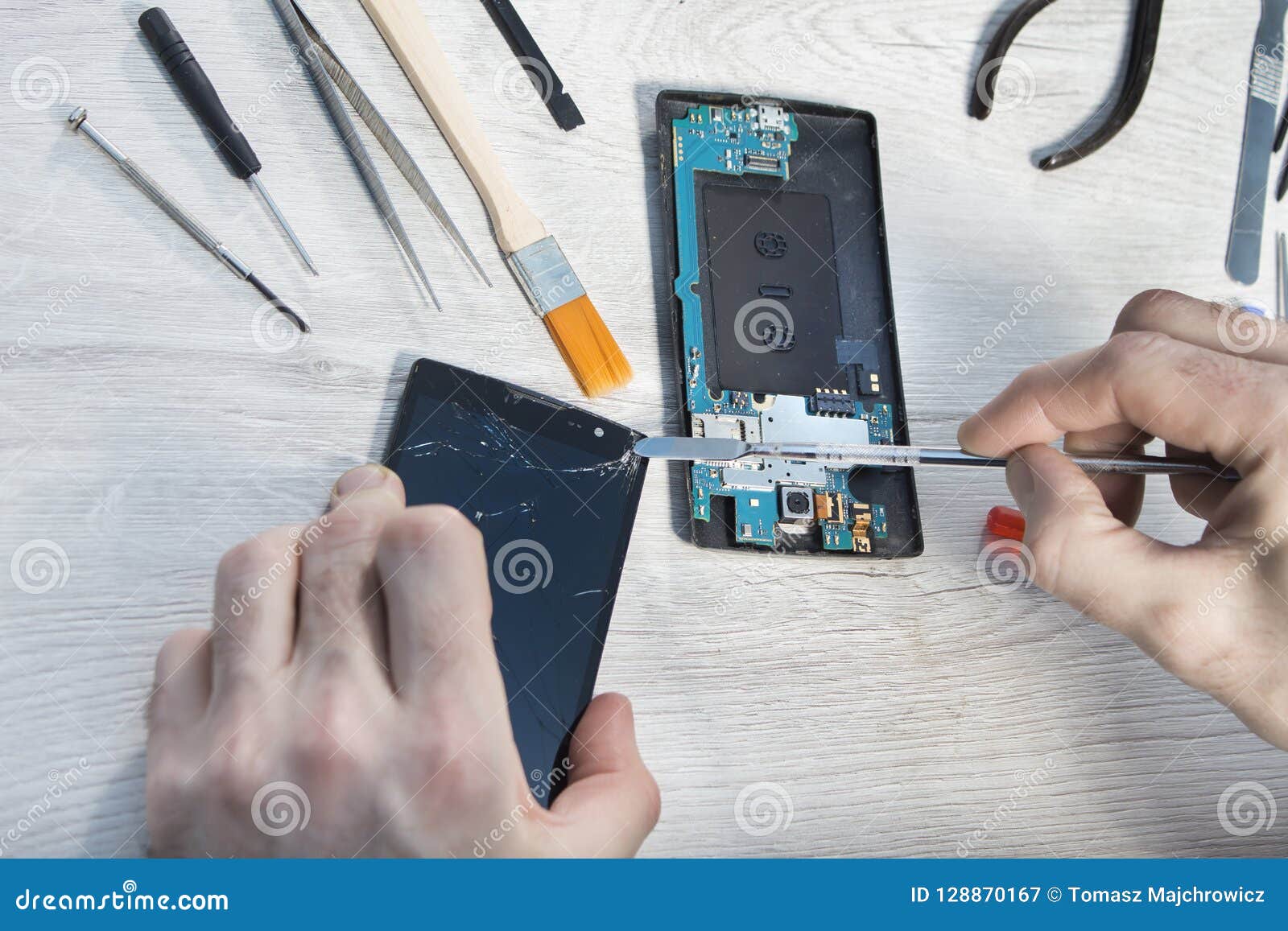 Replacing Broken Glass on a Mobile Phone in a Mobile Phone Service ...