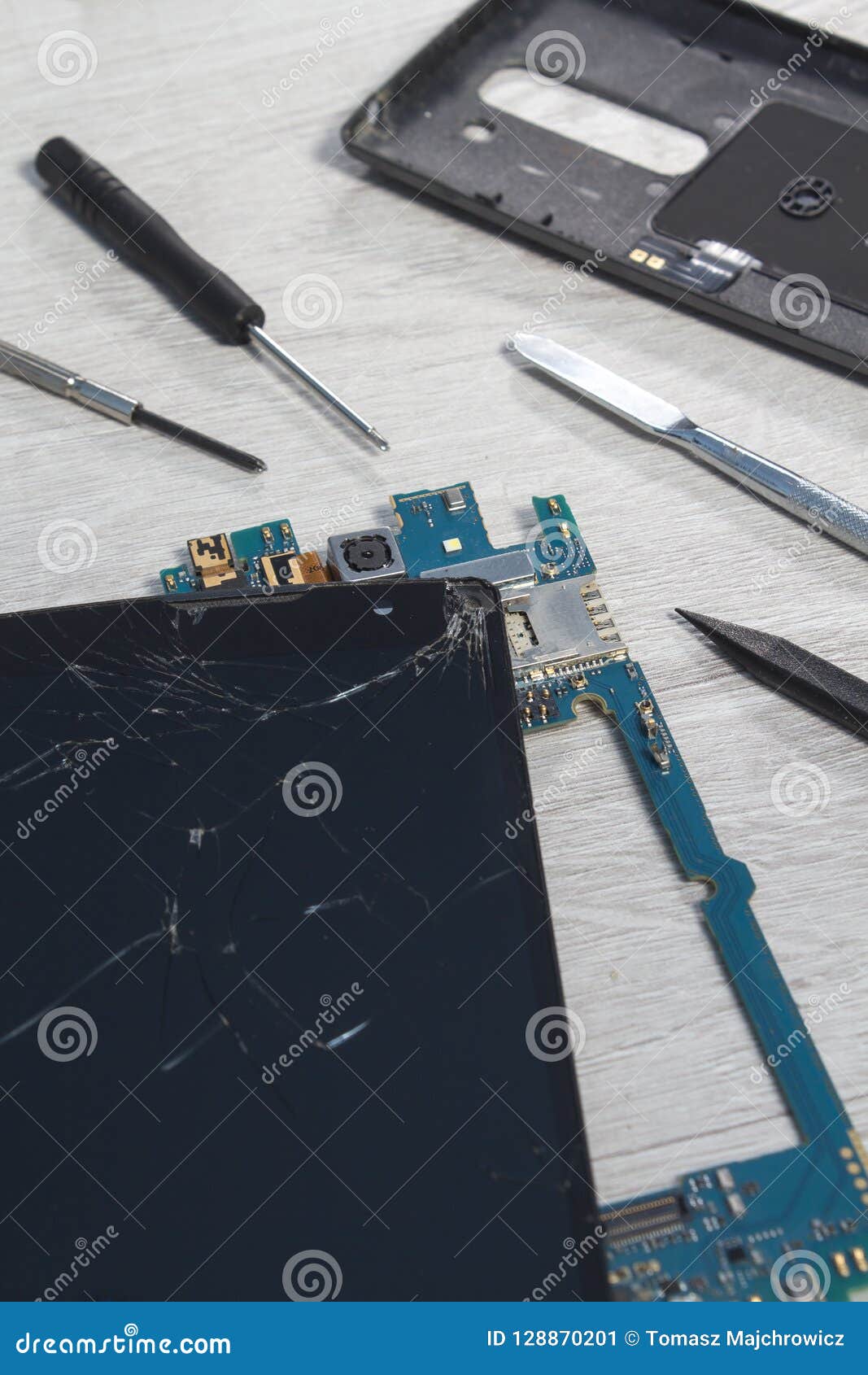 Replacing Broken Glass on a Mobile Phone in a Mobile Phone Service ...