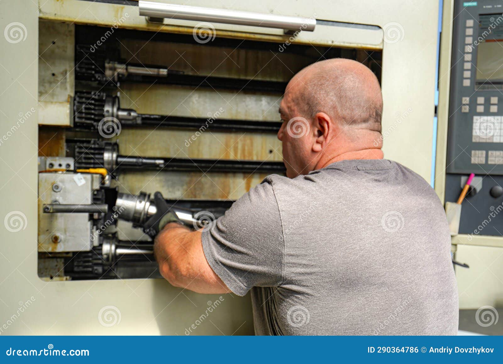 Replacing the Cutting Tool in the Tool Shop of a CNC Milling Machine ...