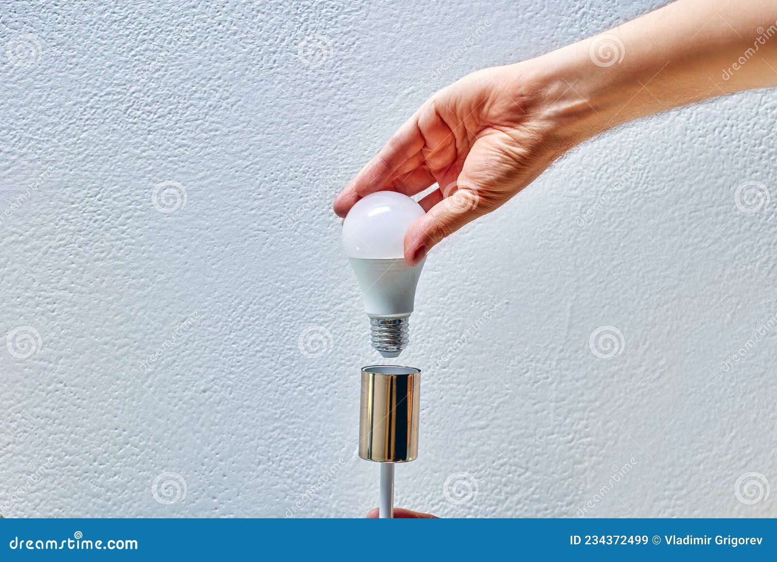 Replacing an LED Light Bulb in Household Lighting Fixture for Home ...