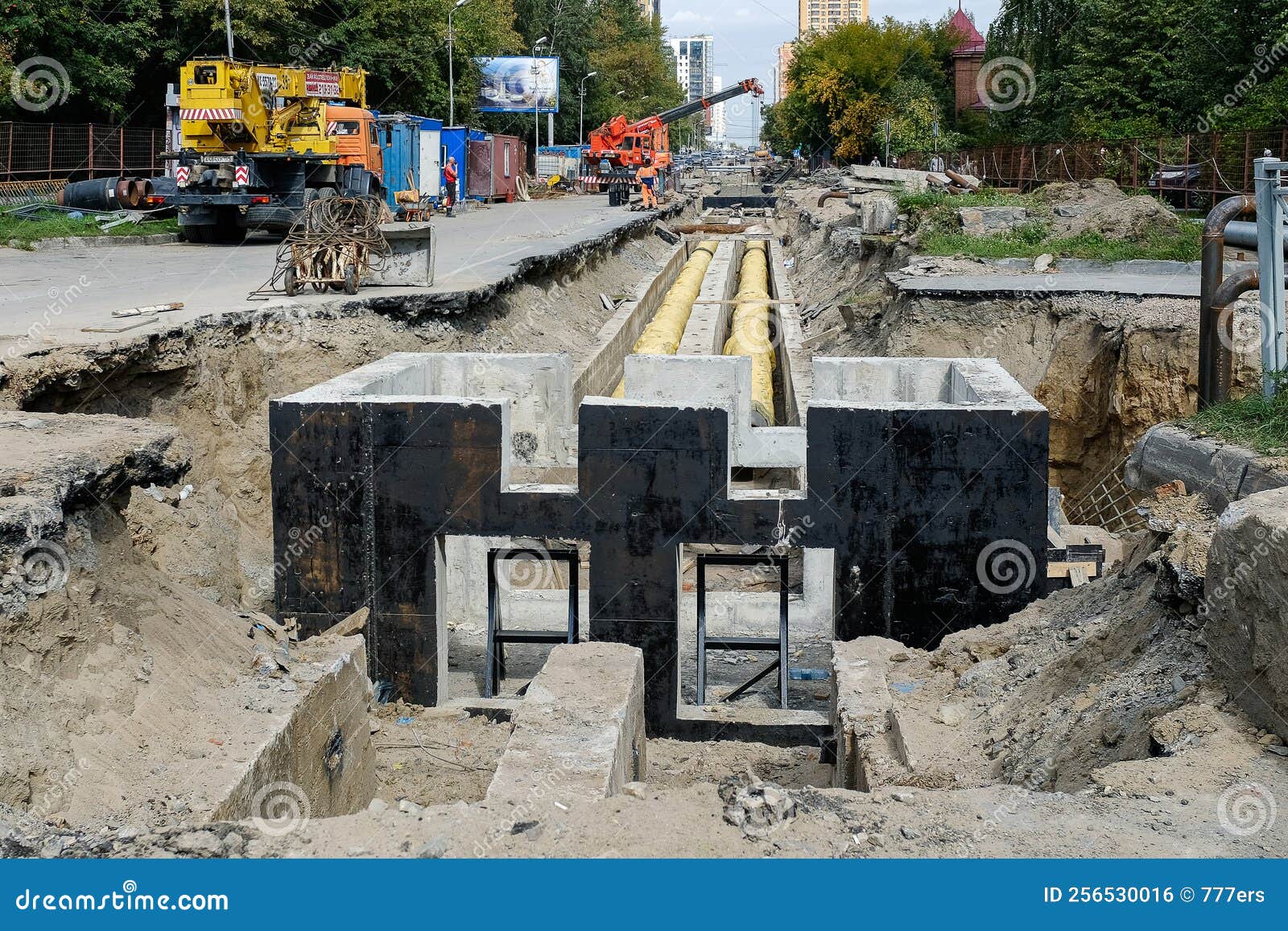 Replacing Old Pipes with New Ones. Installation Work at the ...