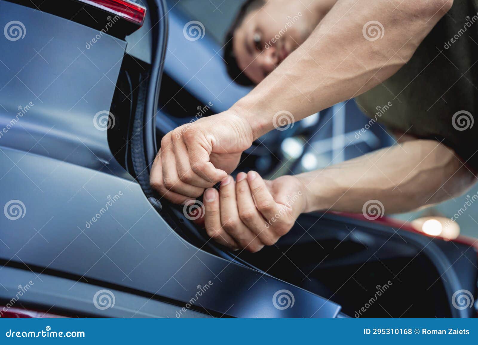 Replacing Spare Parts on a Disassembled Car in a Car Service Garage ...