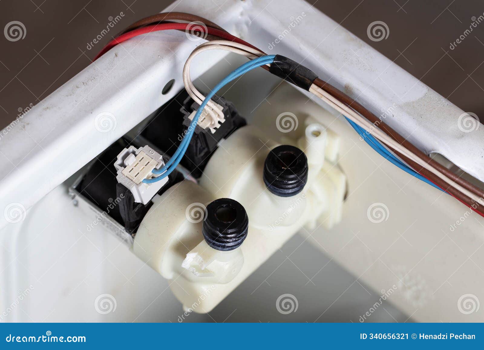 Replacing Water Supply Valves in a Washing Machine, Industry Stock ...