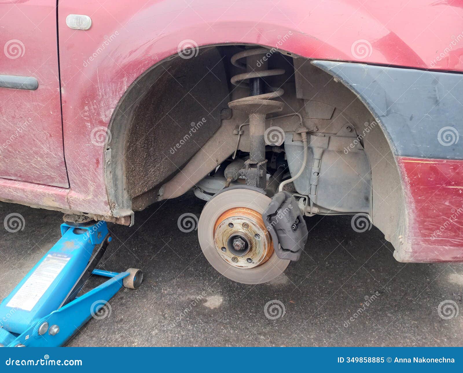 Replacing a Wheel on a Passenger Car Stock Image - Image of routine ...