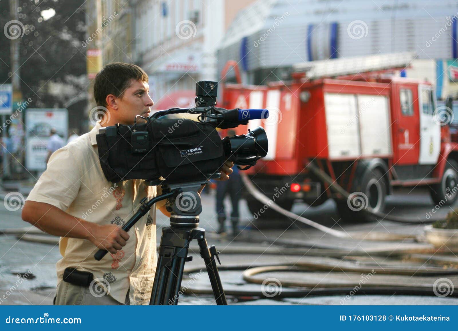 The Reporter Reports on the Fire in the Building from the Scene ...