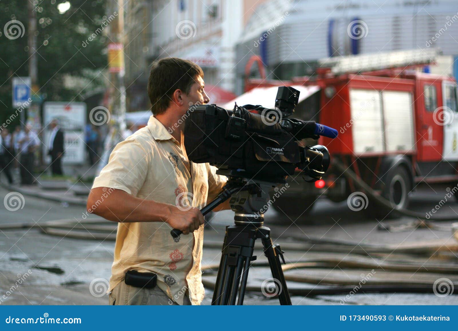 The Reporter Reports on the Fire in the Building from the Scene ...