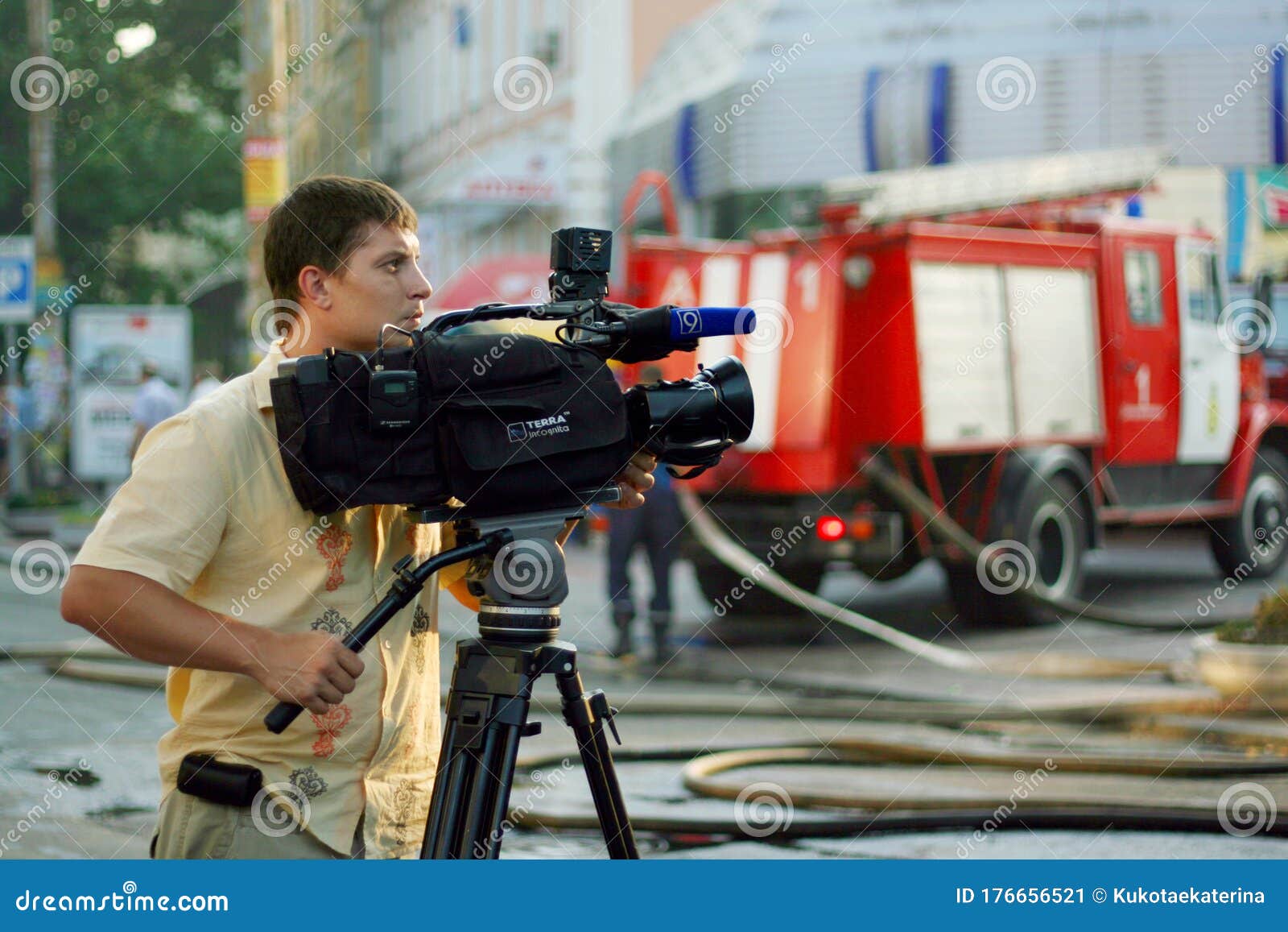 The Reporter Reports on the Fire in the Building from the Scene ...