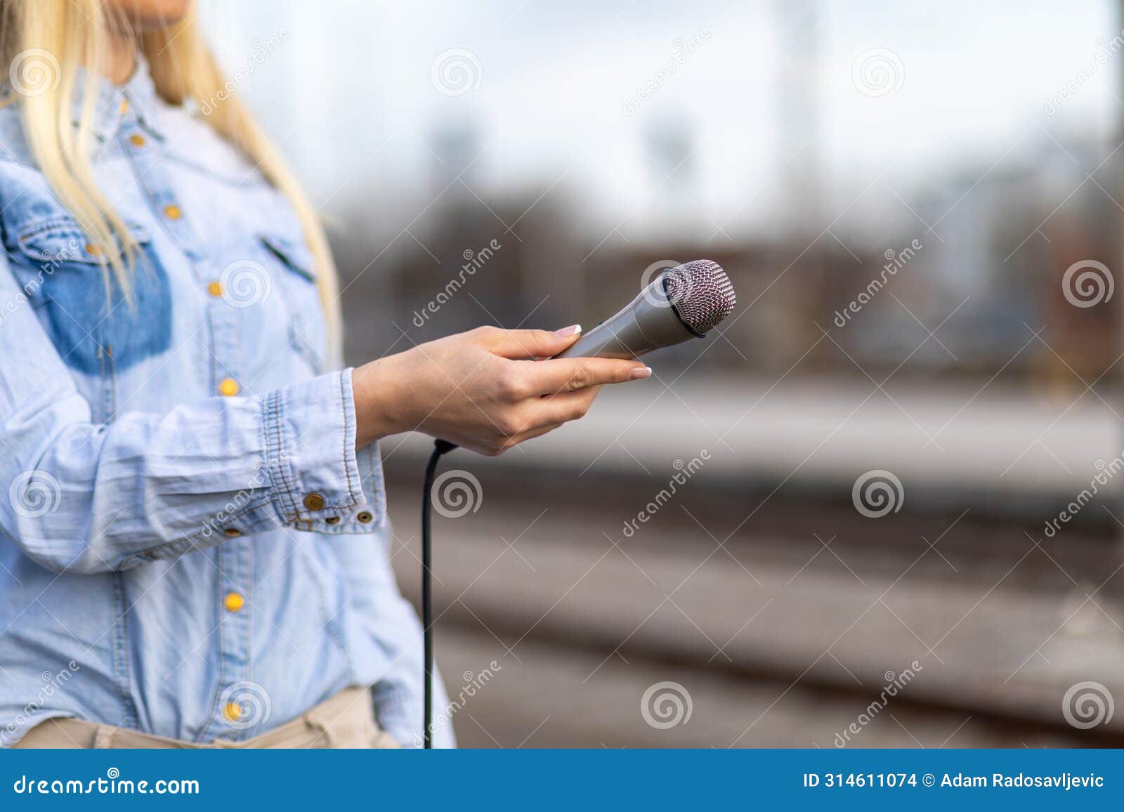 Reporter on the Spot, Holding Microphone in Hand Stock Photo - Image of ...