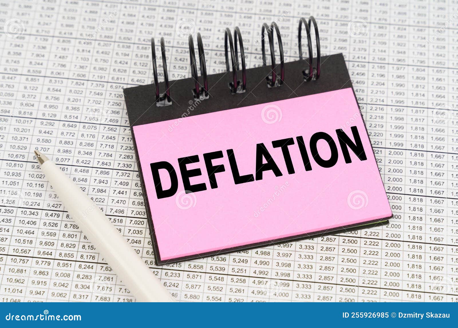 On Reporting Documents and Charts There is a Pen and a Notepad with the ...