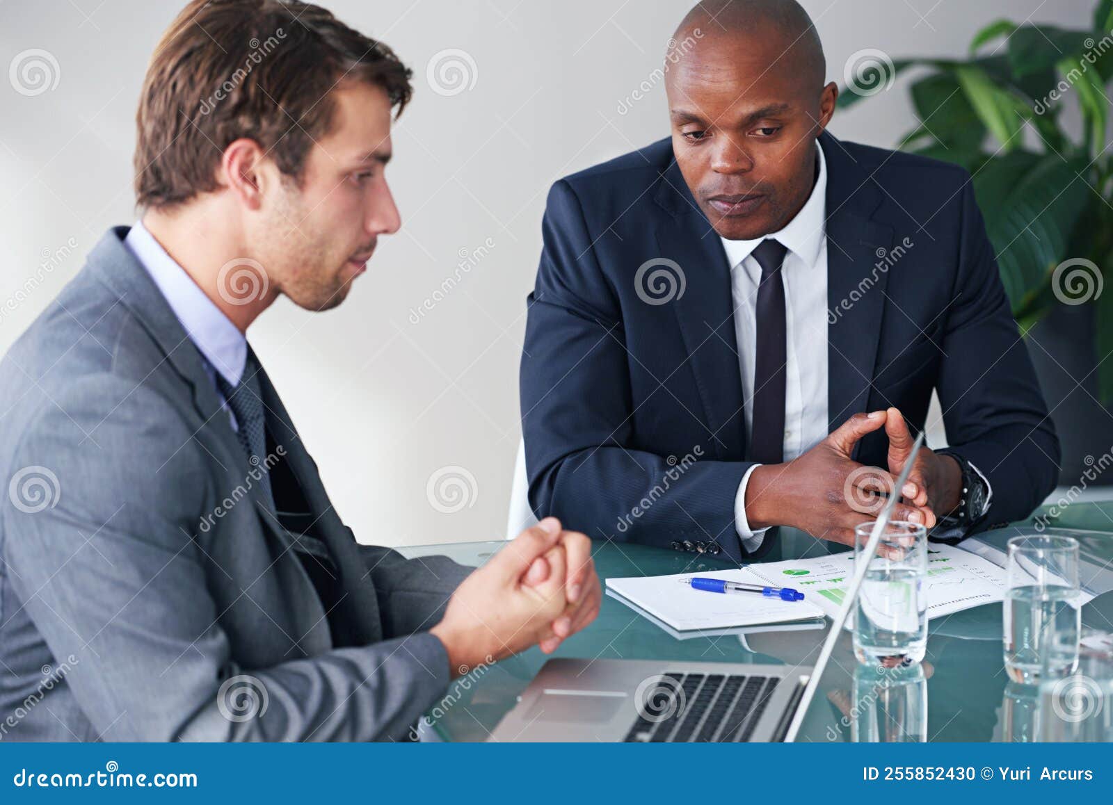 Reporting To Management. Two Businessmen Discussing Work while Sitting ...