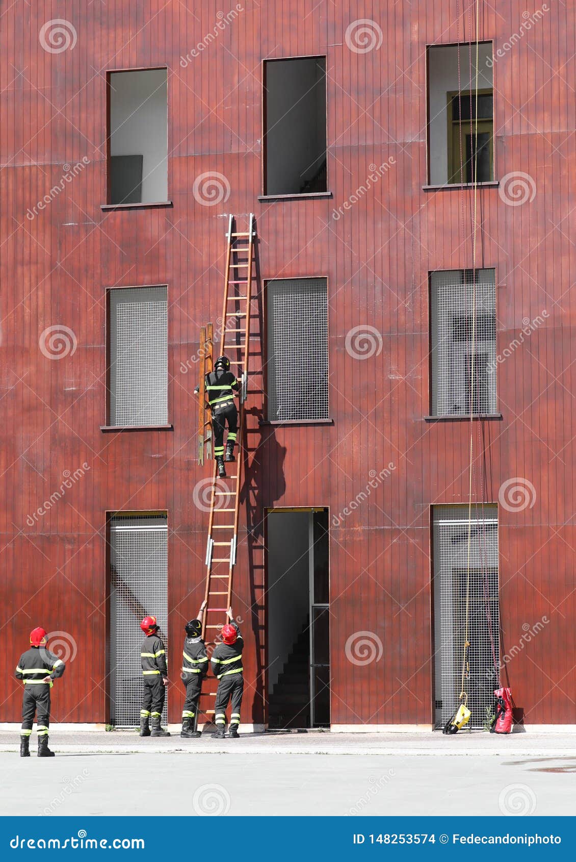 Rescue Exercises with Ladder and Firefighter in the Fire Station Stock ...