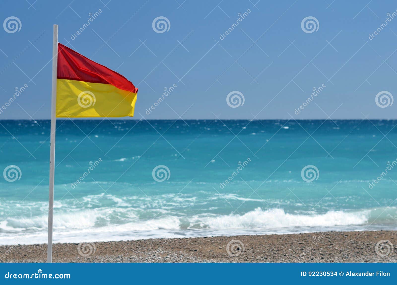 Rescue flag on beach stock photo. Image of season, caution - 92230534