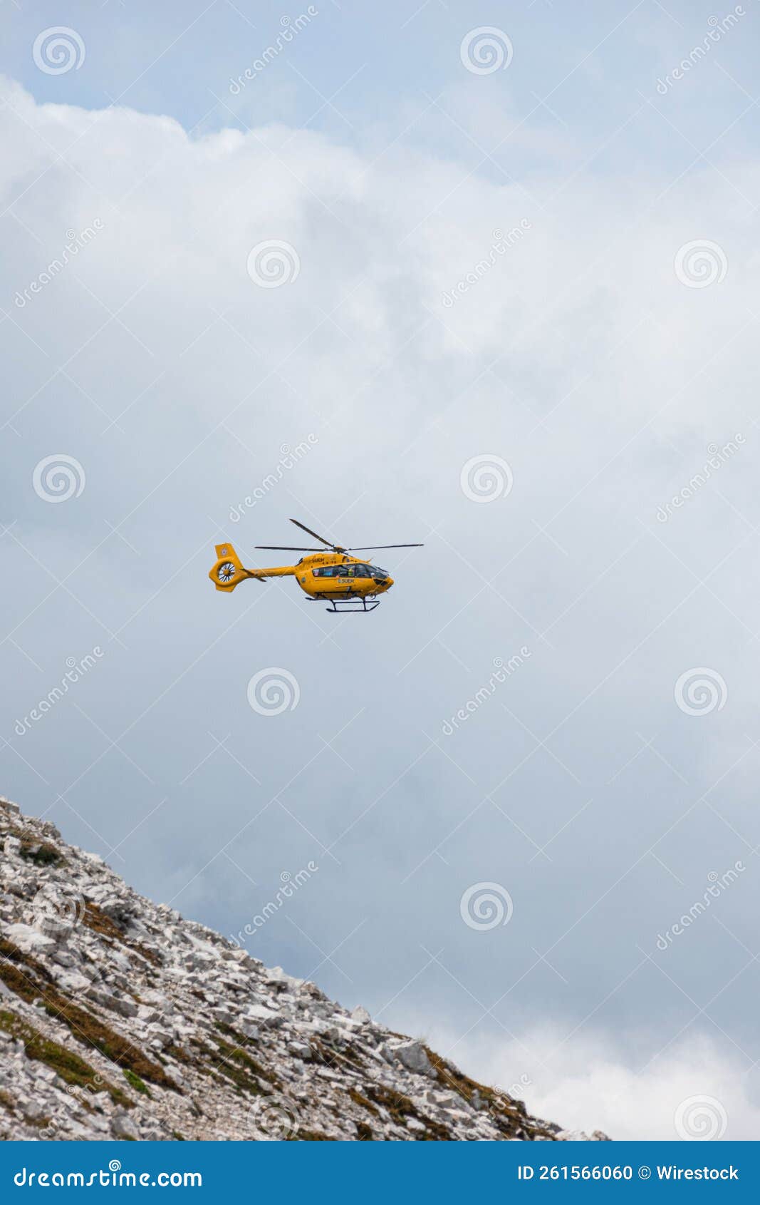 Rescue Helicopter Flying in the Dolomites, Italy Editorial Image ...