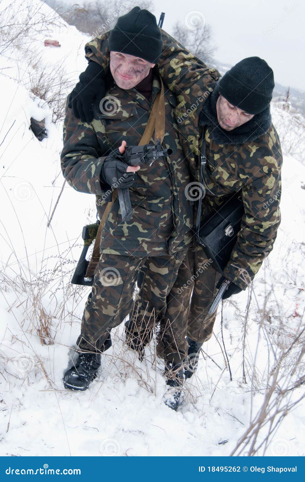 Rescue of Injured of Soldier Stock Photo - Image of firing, bravery ...