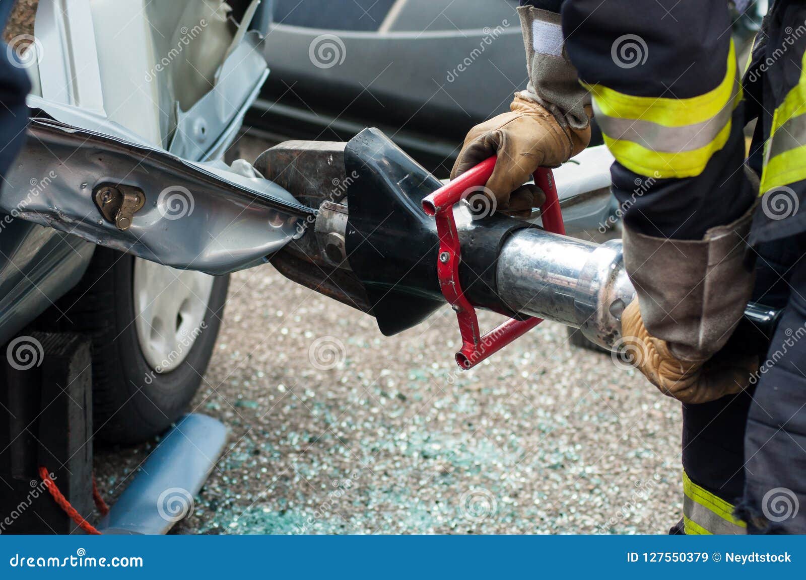 Rescue Man with Pneumatic Machine on Crashed Car Stock Image - Image of ...