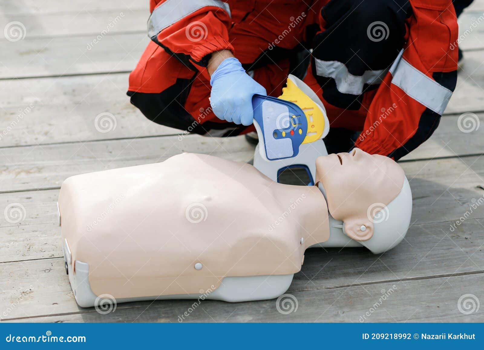 Rescue Team. the Man Shows the Provision of First Aid in the ...