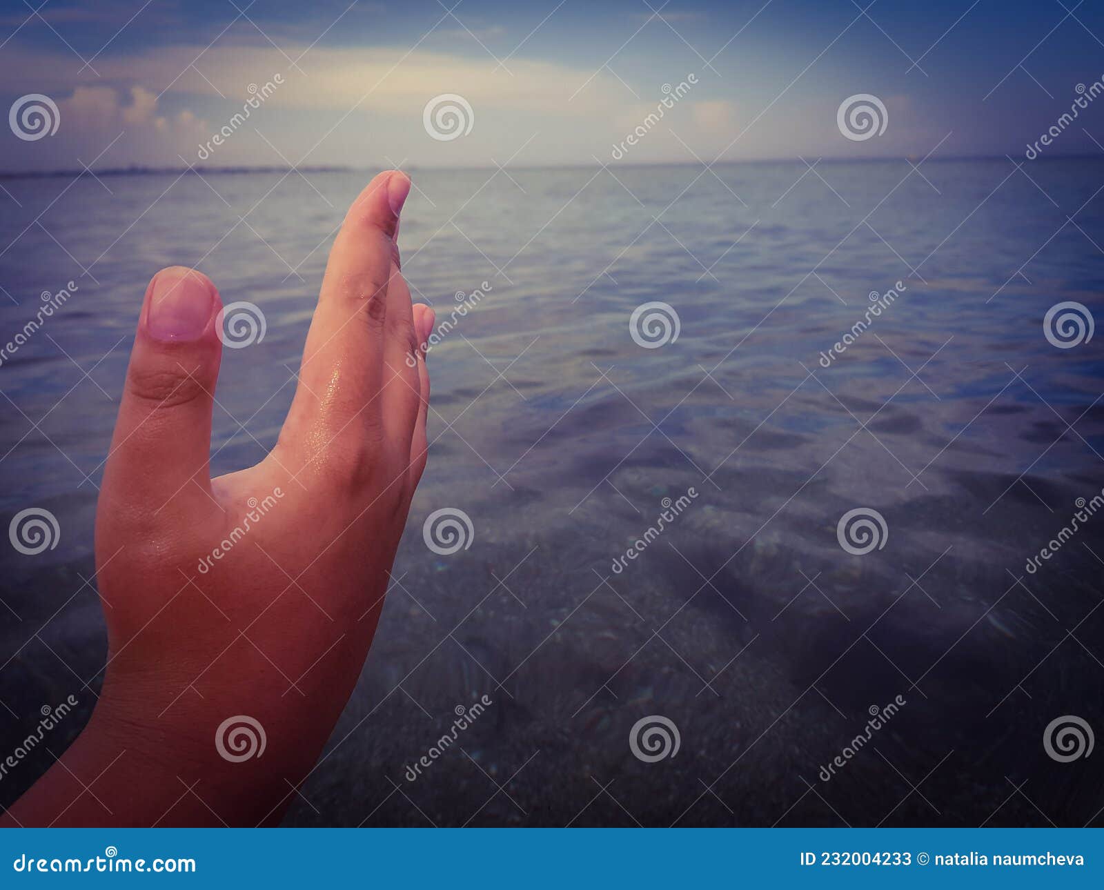 Rescue on the Water .a Hand Sticks Out of the Water. a Drowning Man ...