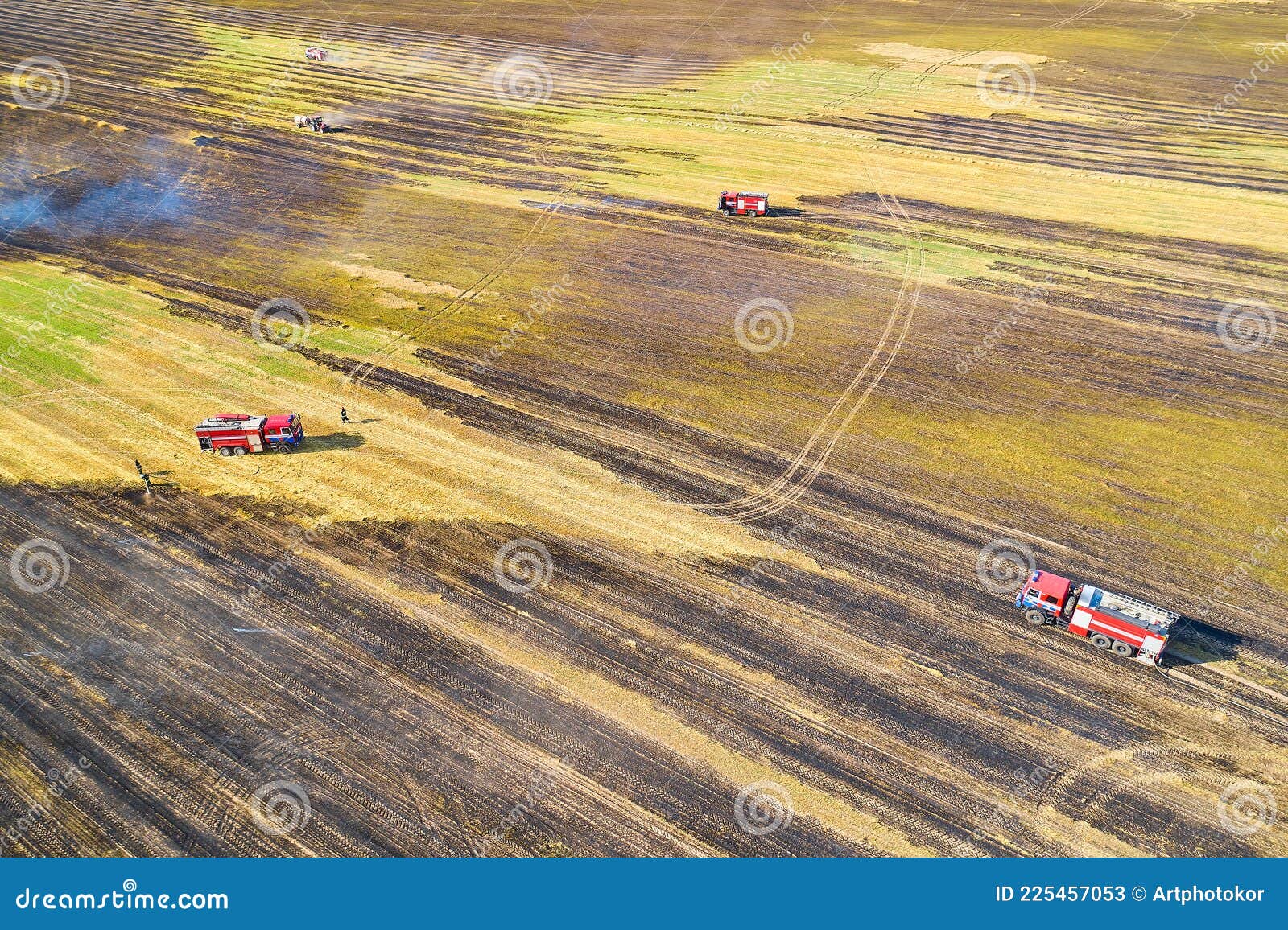 Rescuers Came To Extinguish a Fire in an Open Field Stock Image - Image ...