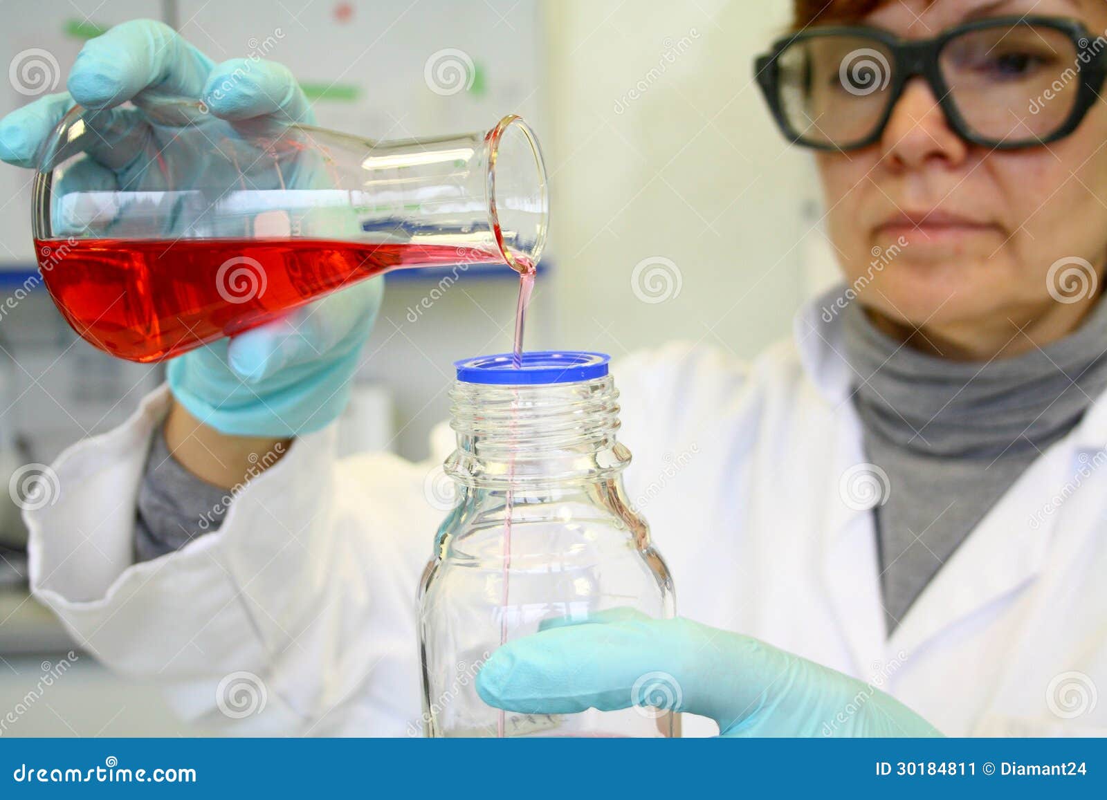 Research Assistant Works with Red Liquid in Laboratory Stock Image ...