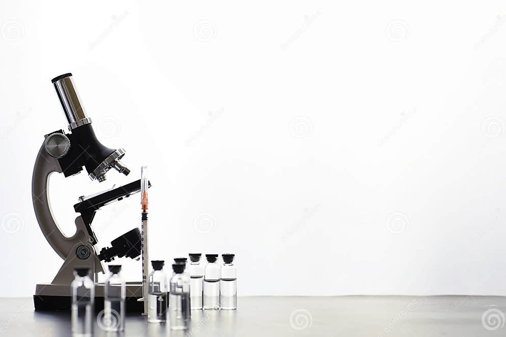 Research Laboratory. Test Tubes and Microscope on the Table on a White ...