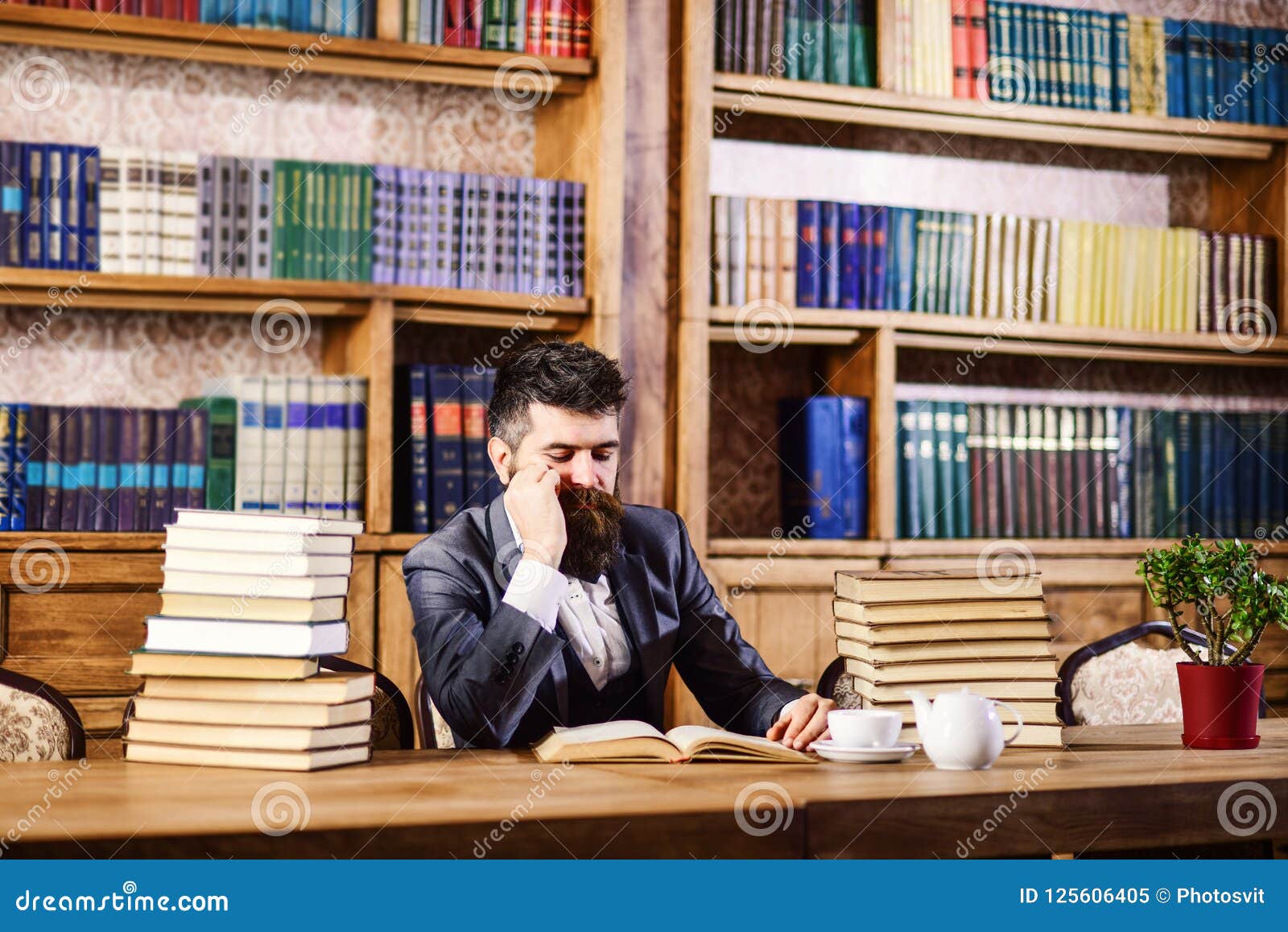 Research and Study Concept. Professor in Library Makes Historical ...