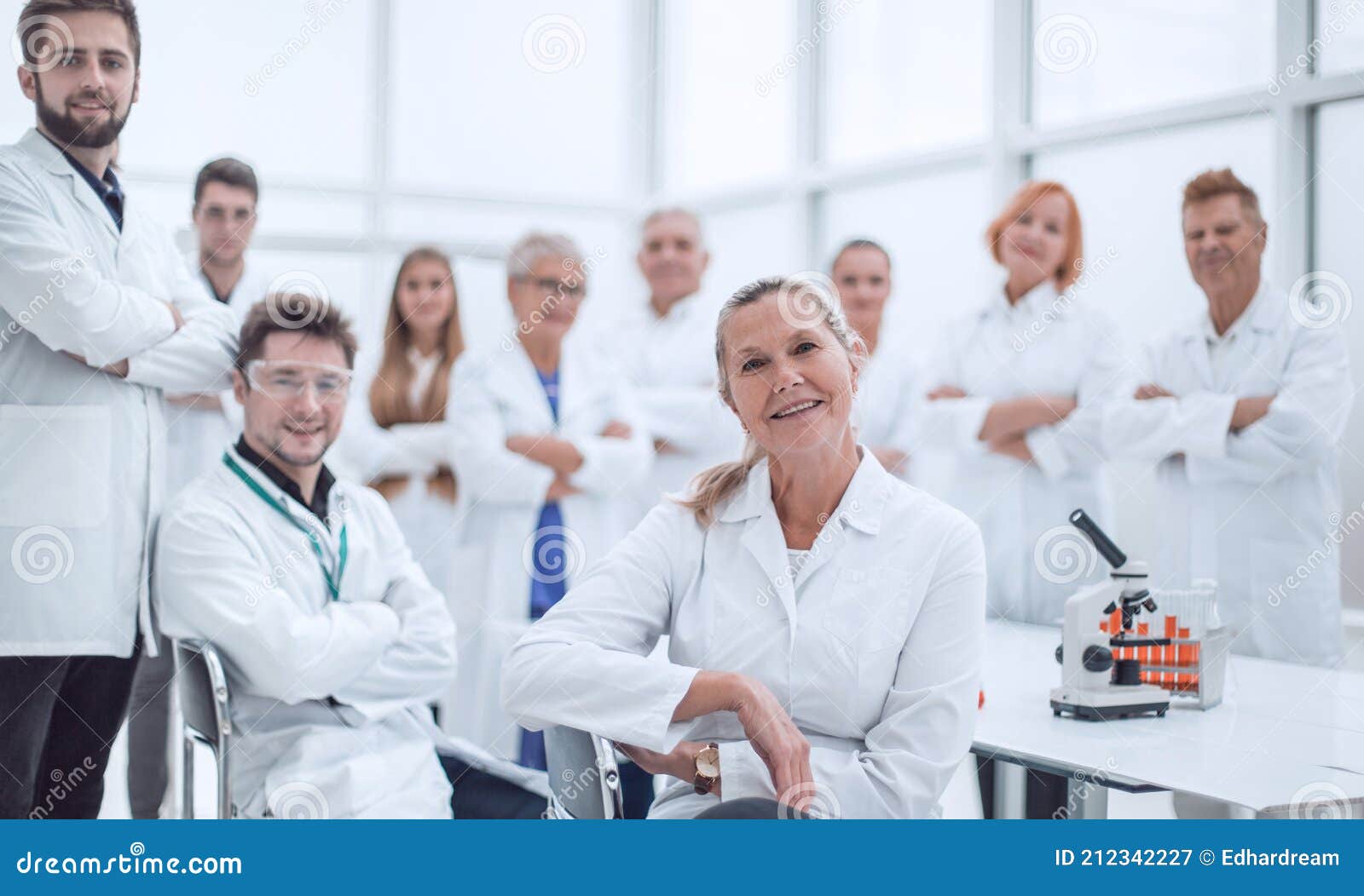 Research Supervisor and a Group of Young Scientists in the Workplace ...