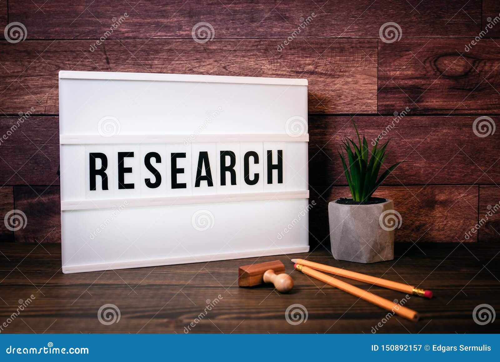 Research. Text in lightbox stock image. Image of document - 150892157
