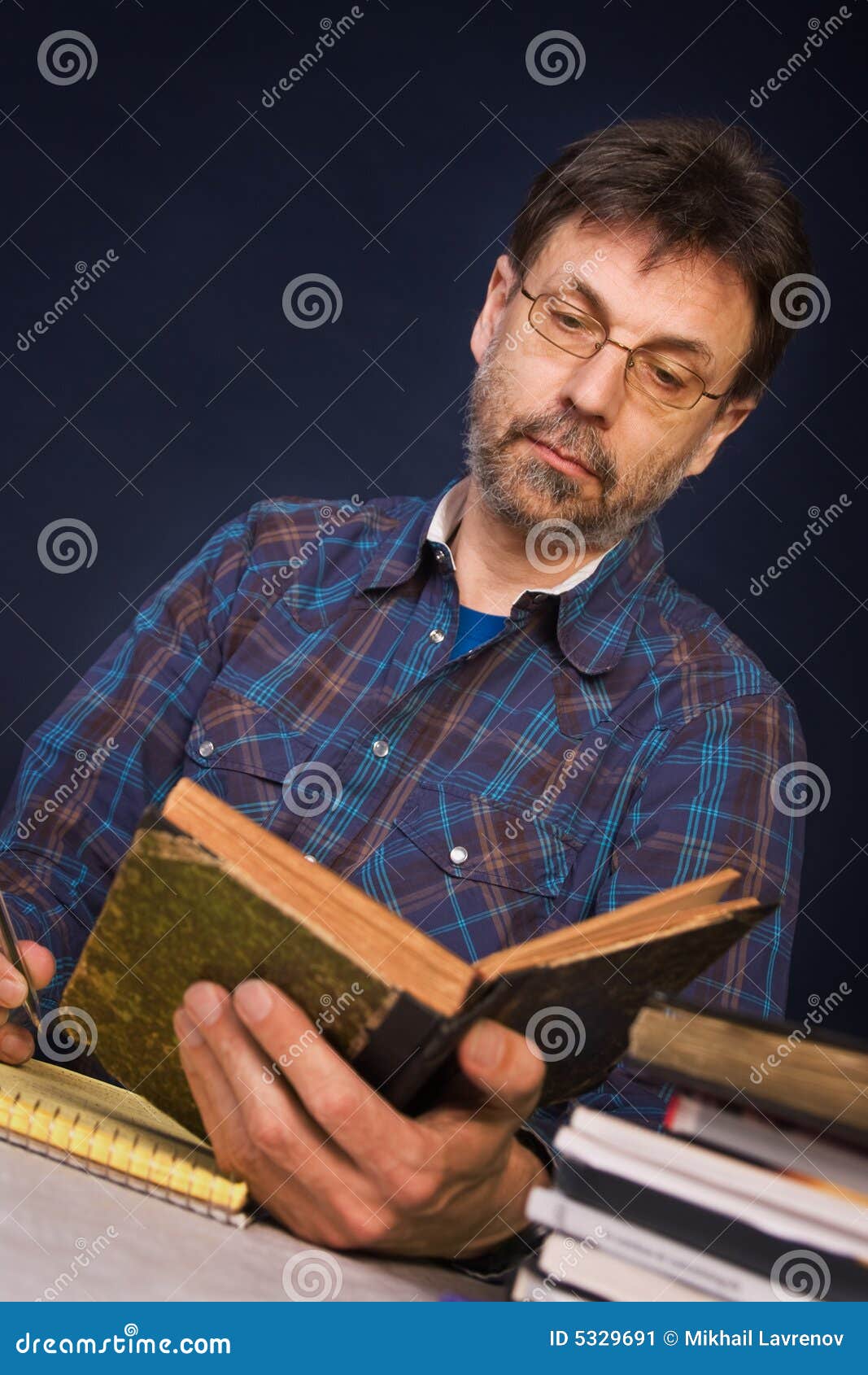 Researcher with his books stock image. Image of concentrated - 5329691