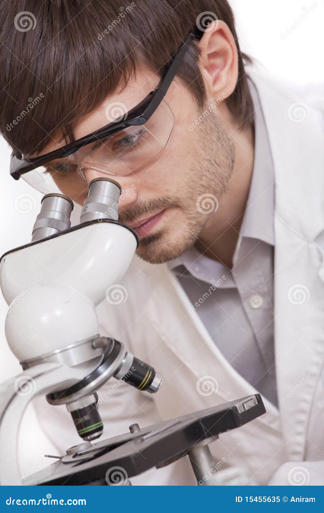 Researcher Looking in Microscope Stock Image - Image of male, studying ...