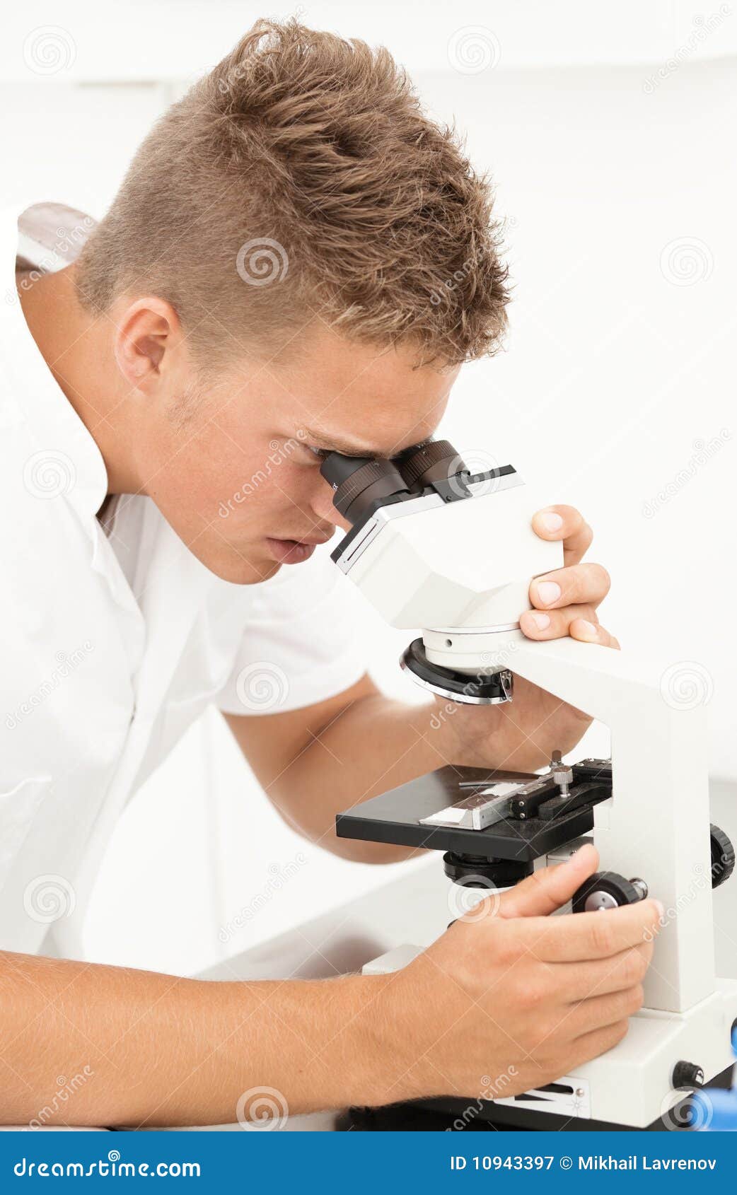 Researcher with microscope stock image. Image of male - 10943397