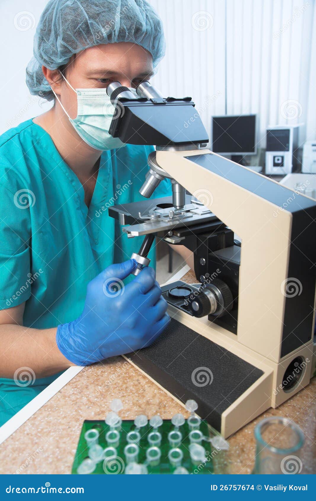 Researcher with microscope stock photo. Image of analysis - 26757674