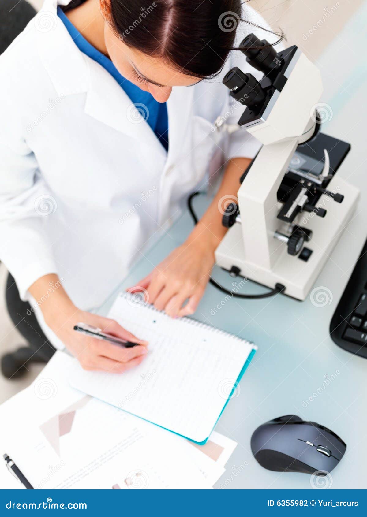 Researcher with Microscope on Table Stock Photo - Image of hand, human ...
