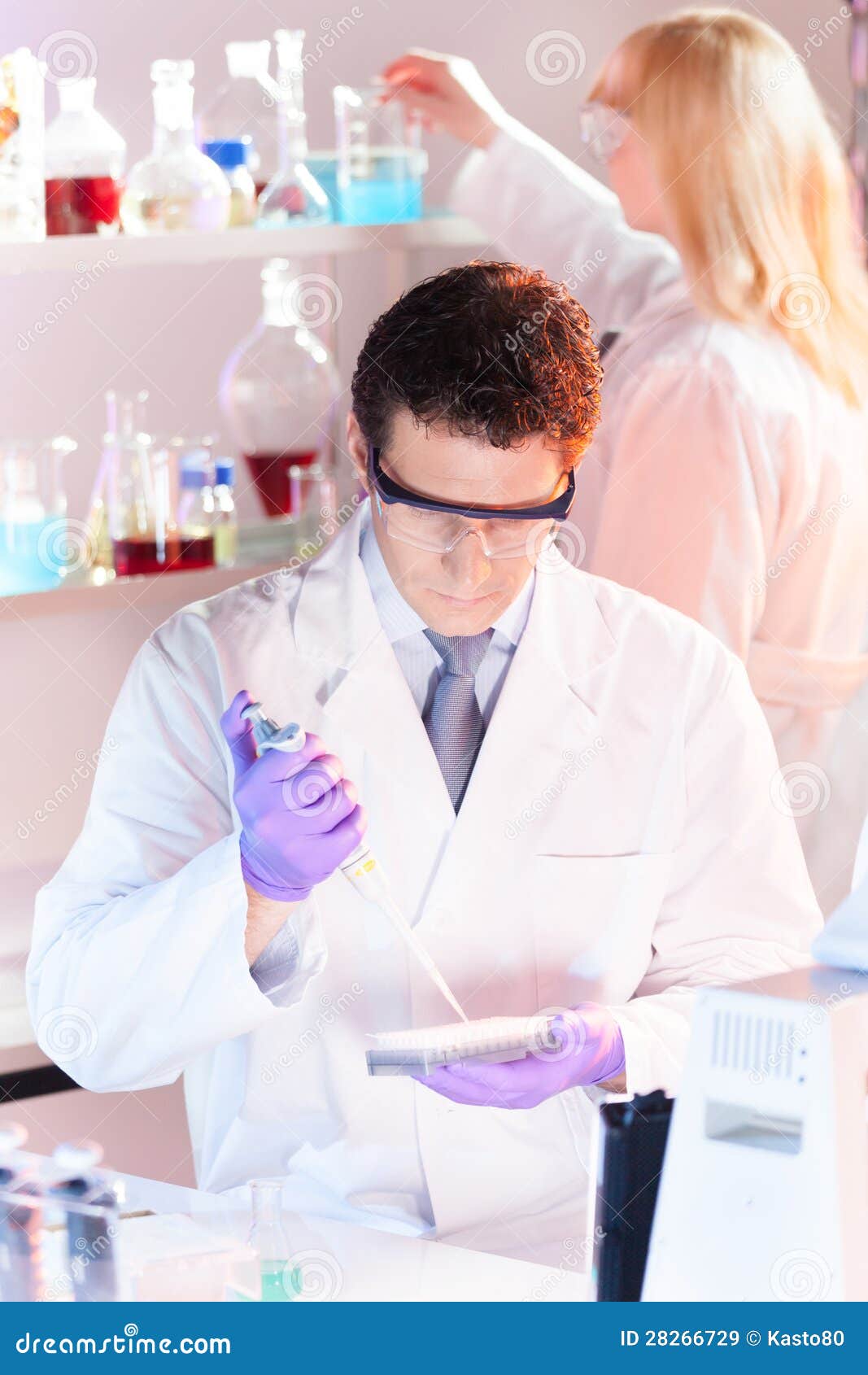 Researcher Pipetting in Laboratory. Stock Image - Image of hospital ...