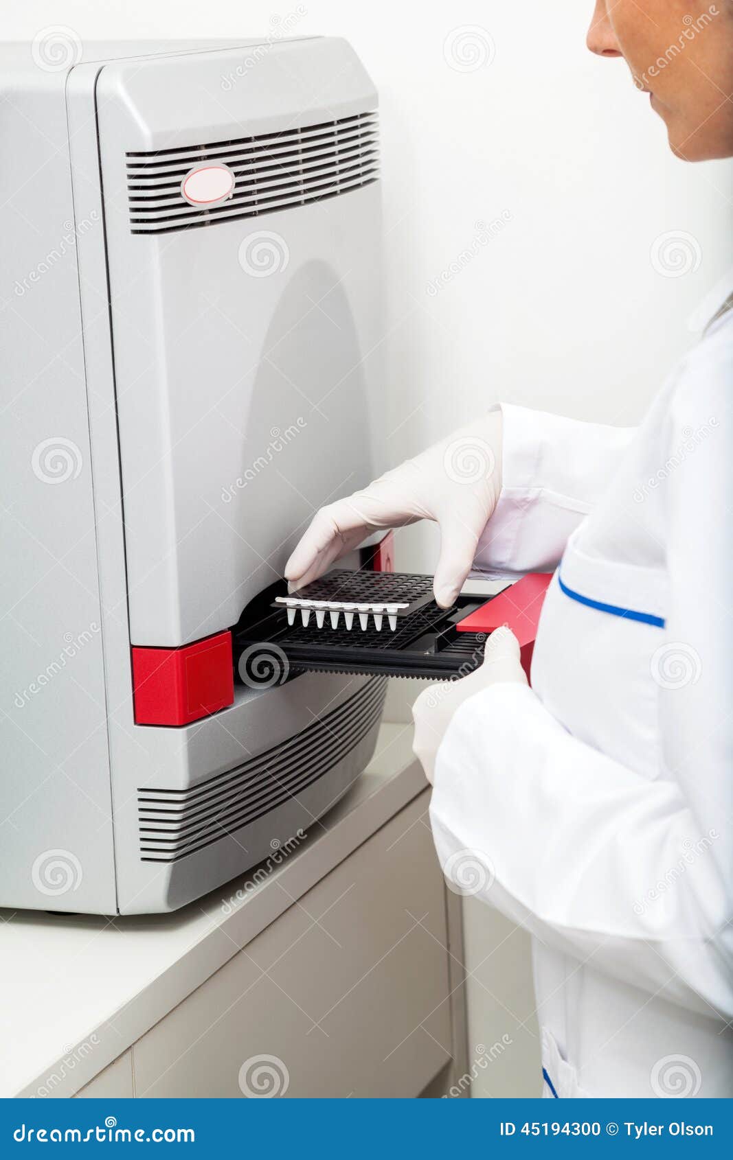 Researcher Placing Samples in Machine Stock Photo - Image of diagnostic ...