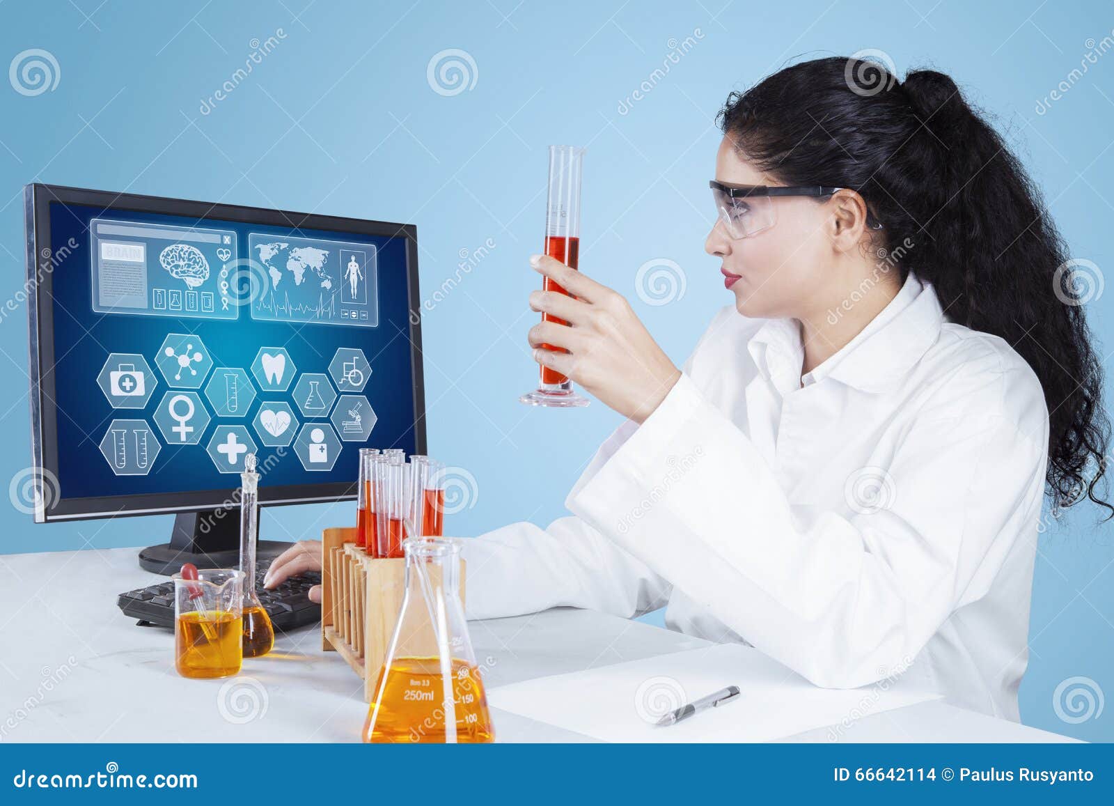 Researcher Using Computer while Making Experiment Stock Photo - Image ...