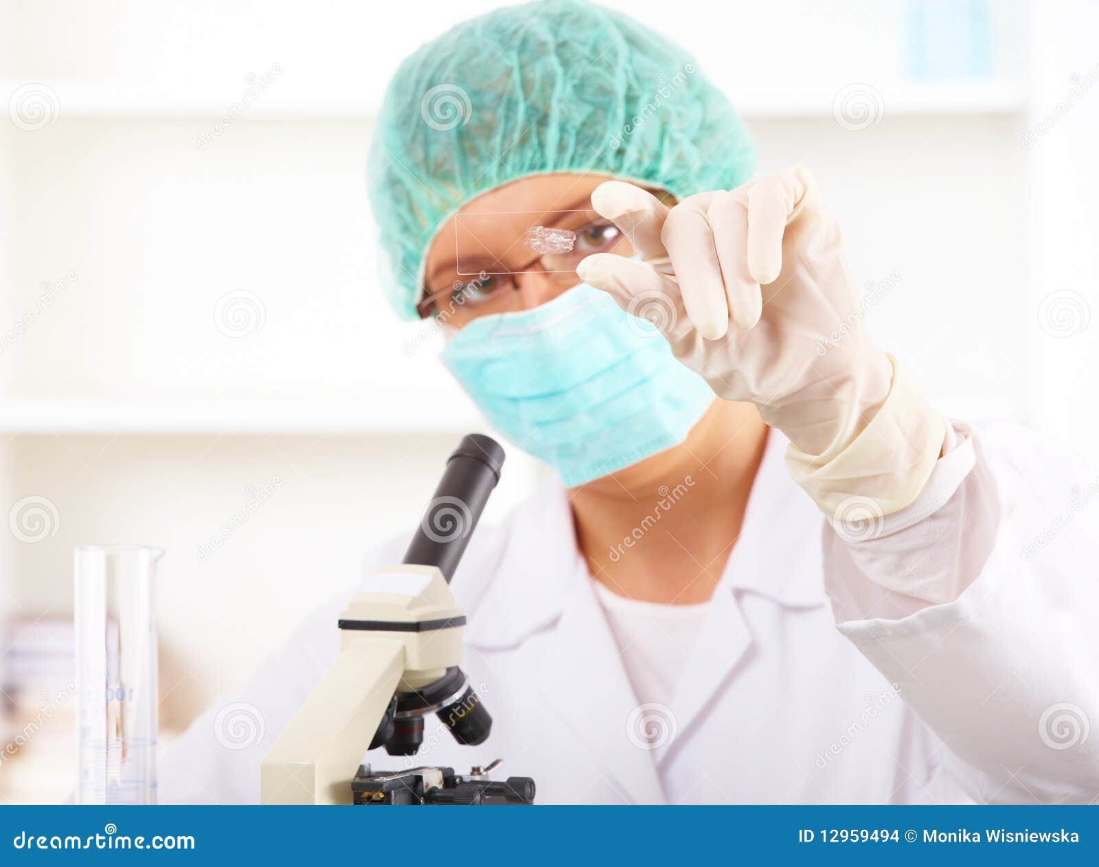 Researcher Using a Microscope in a Laboratory Stock Photo - Image of ...